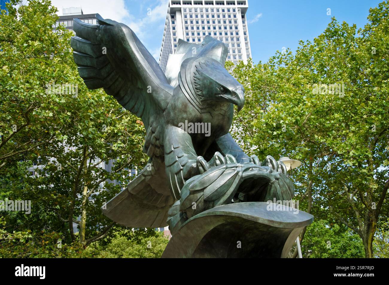 New York City's Battery Park: a powerful bronze eagle soars above a ...