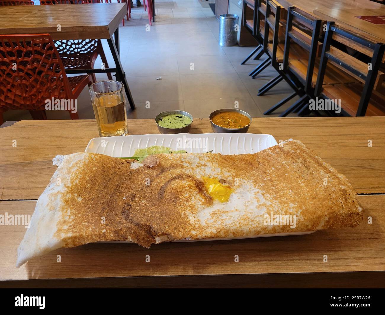 South indian dosa combined with coconut chutny and tomato chutney and ...