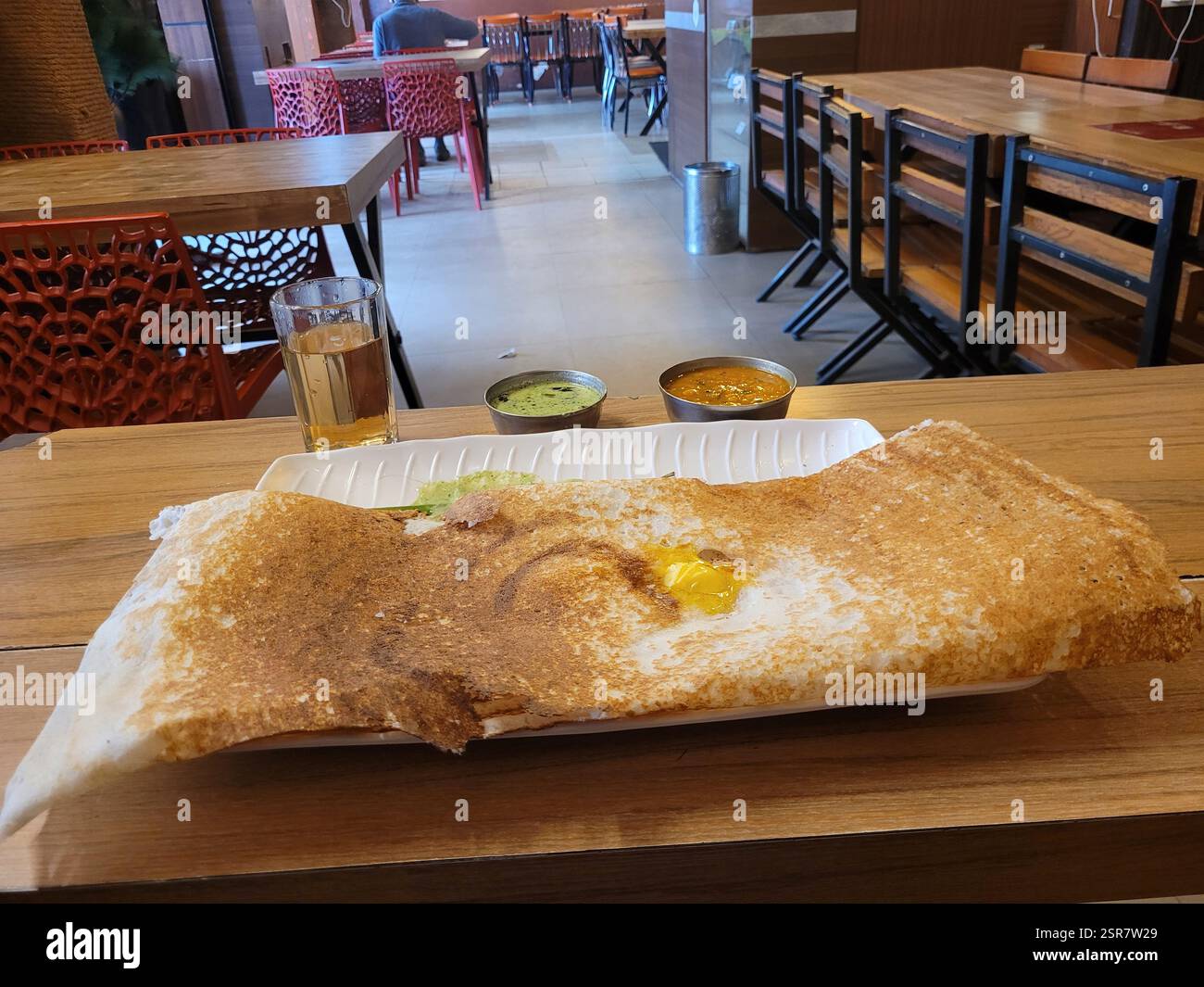 South indian dosa combined with coconut chutny and tomato chutney and ...