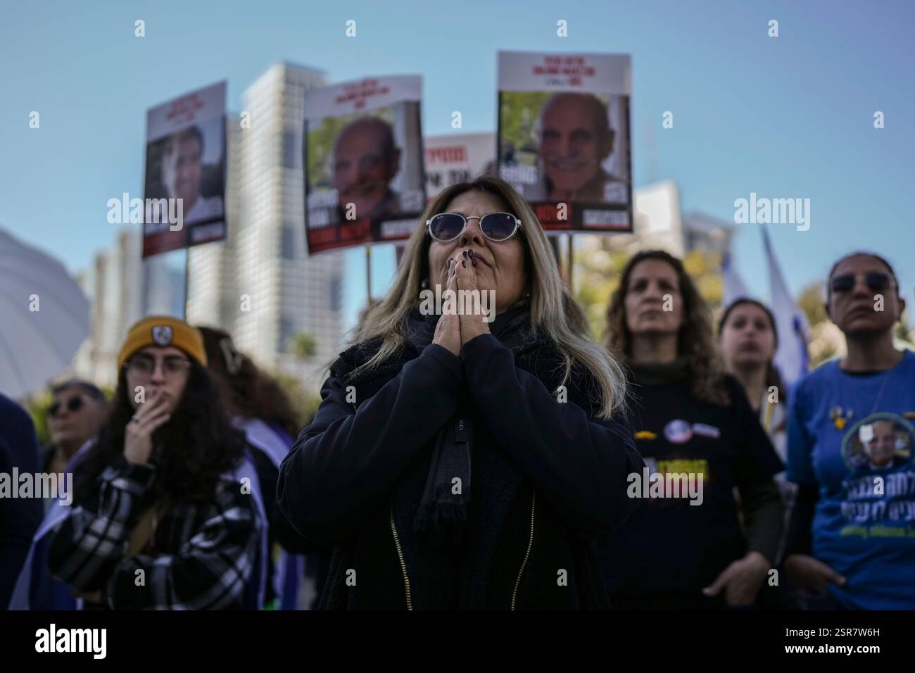 Israelis gather at Hostages Square, waiting for the release of Iair Horn, Sagui Dekel Chen, and ...