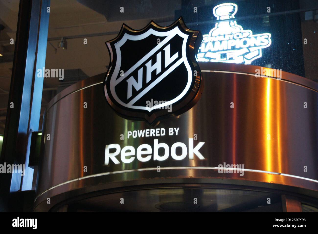 A building entrance with Reebok and NHL logos and text mentioning ...