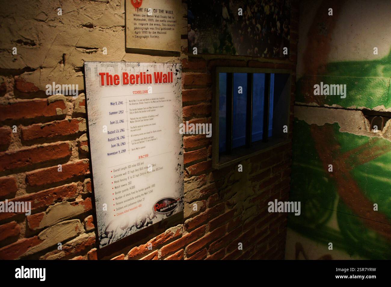 Text splashed across a brick wall in New York, Manhattan, reads about ...