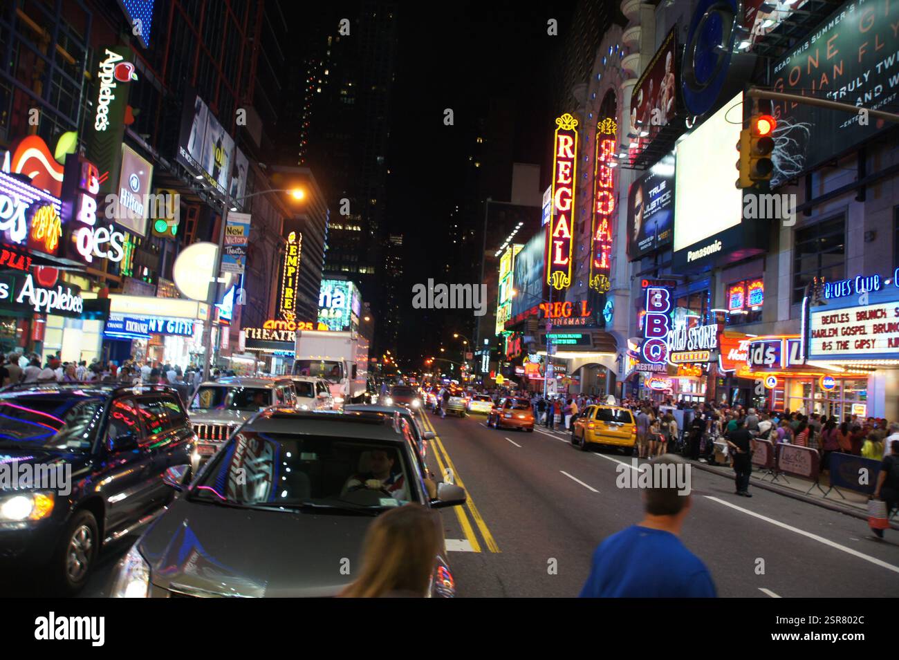 New York, Manhattan. A billboard in Times Square pulsates with colorful ...