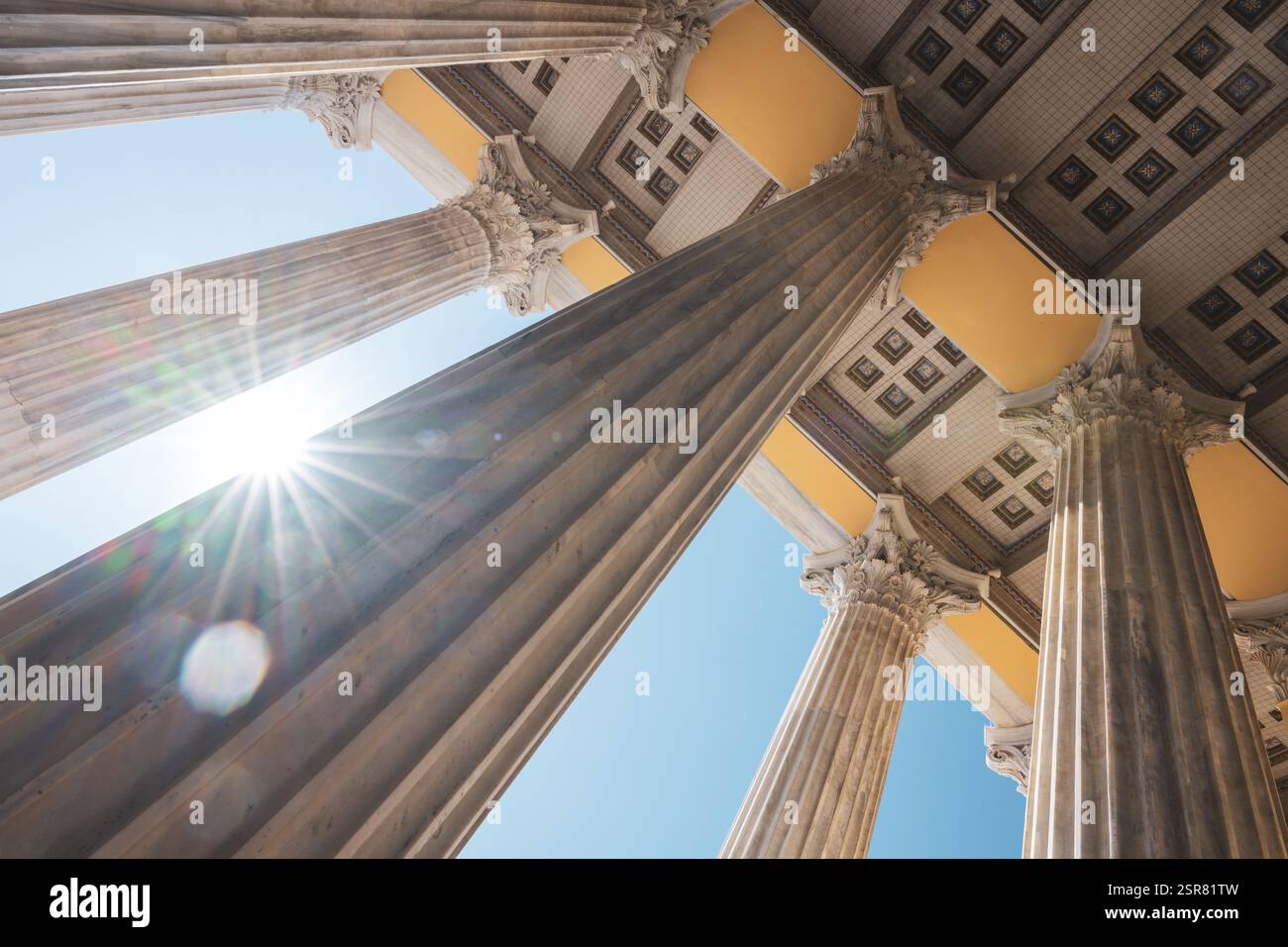Sunlit Corinthian columns of classical architecture on Zappeion hall ...