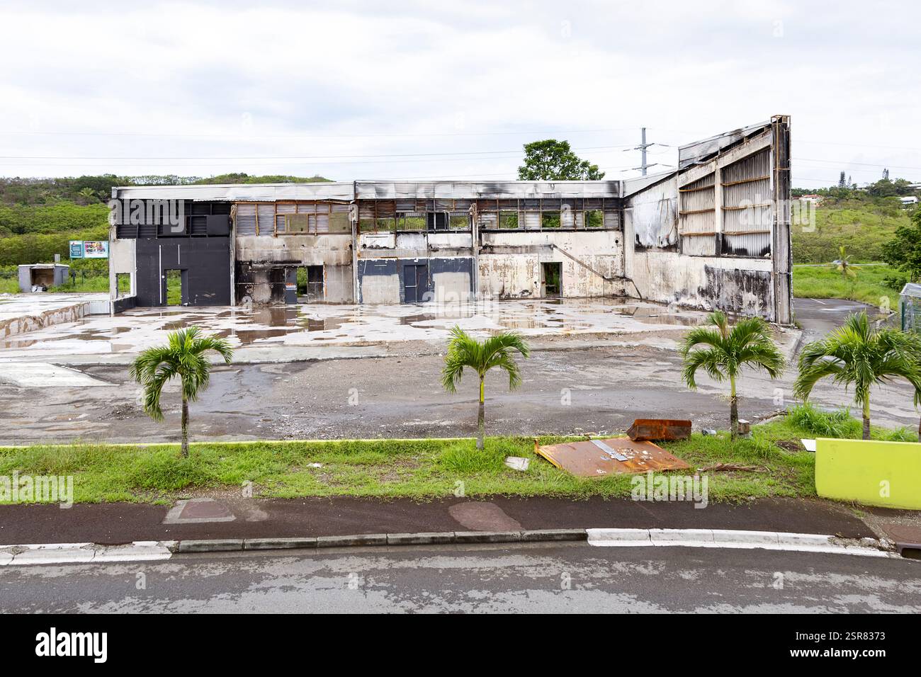 Building with stores destroyed at Kenu-In shopping center in Dumbea on ...