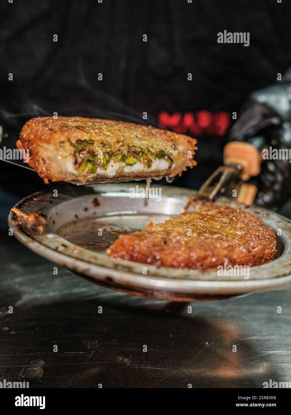 Ready to serve kunafa. Kunafa, at famous dessert of the Middle East, is ...