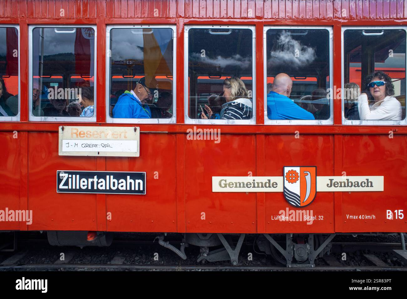 Tourists inside Zillertal Railway or Zillertalbahn, Jenbach station ...