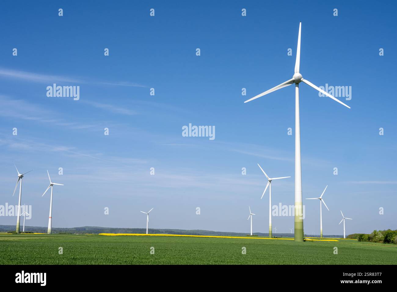 Modern wind turbines with green fields seen in Germany Stock Photo - Alamy