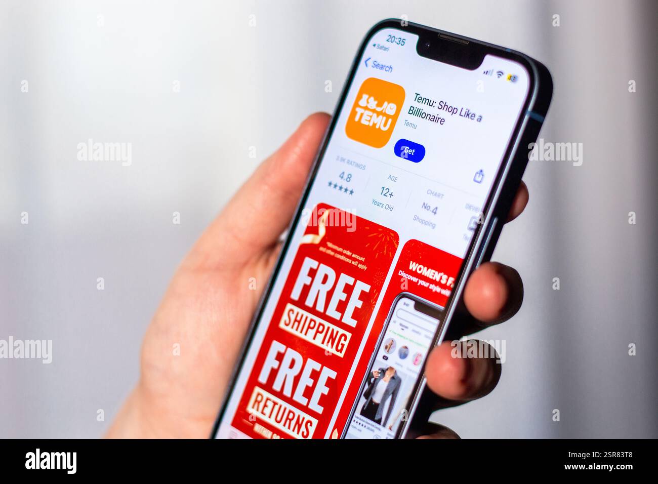 Kaliningrad, Russia 14.01.25 - Woman holding iPhone and downloading TEMU application from app ...