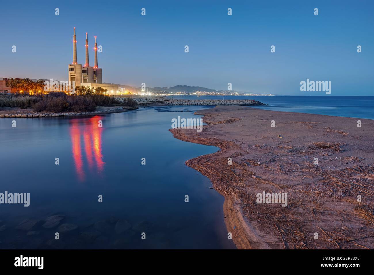 The shutdown thermal power station and the mouth of the Besos river at ...