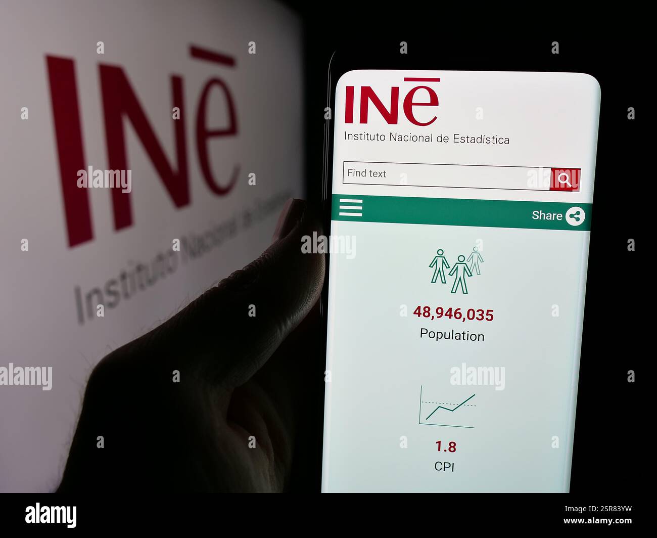 In this photo illustration, a person is holding a mobile phone with the ...