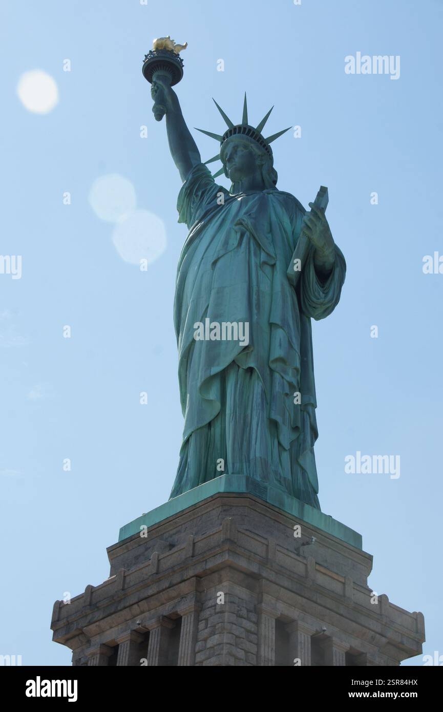 New York, Manhattan's iconic Statue of Liberty stands tall against a ...