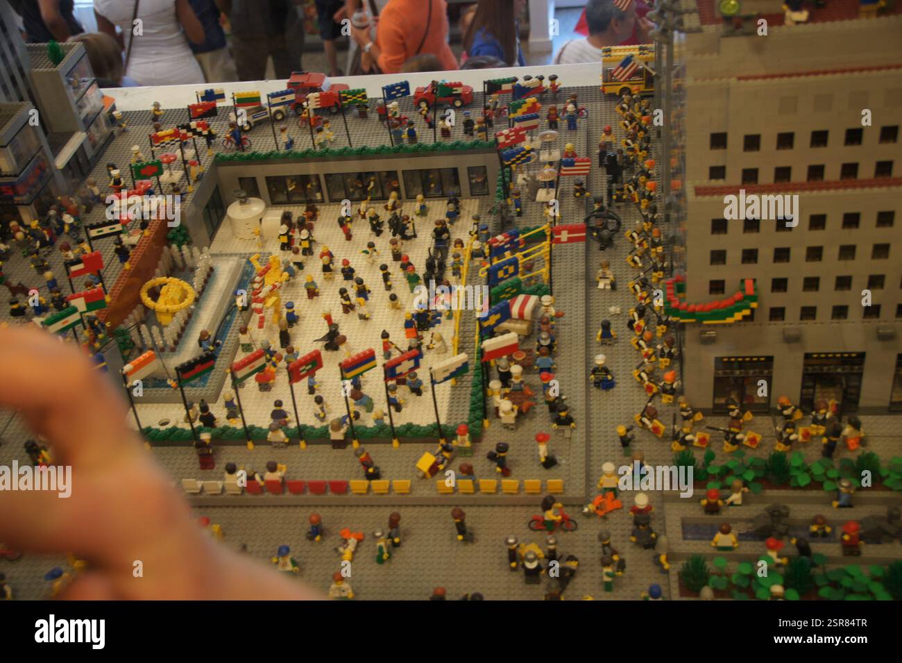 Manhattan marvels at miniature magic. A crowd of all ages gathers ...