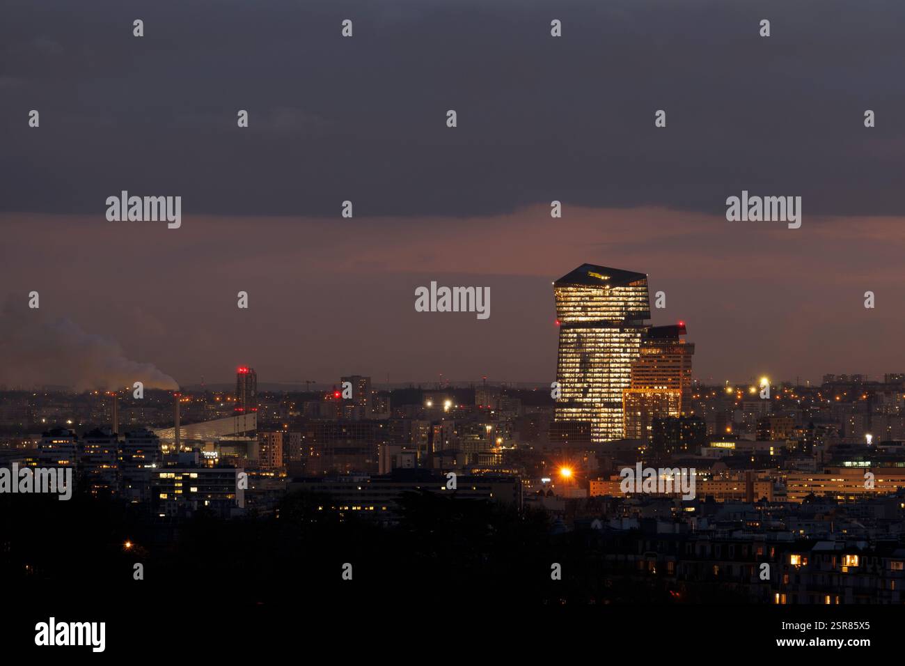Aerial night view of the Tours Duo located in the 13th arrondissement ...