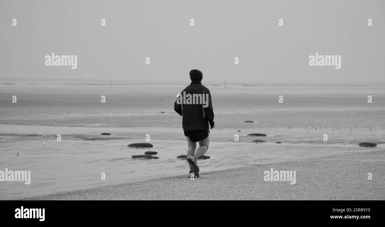 The loneliness of the long distance runner Stock Photo - Alamy