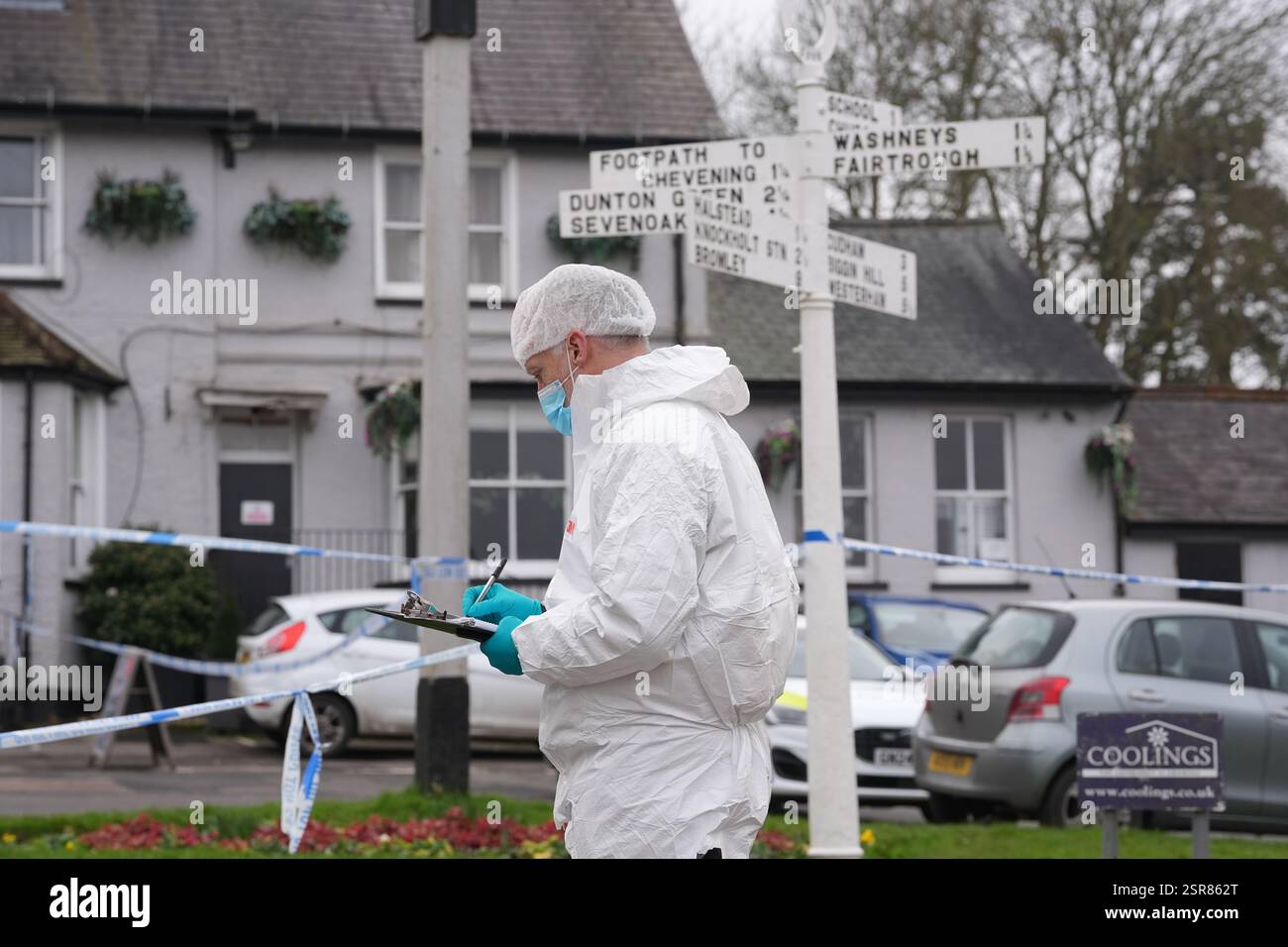 A forensic officer at the Three Horseshoes pub in Knockholt, Sevenoaks ...