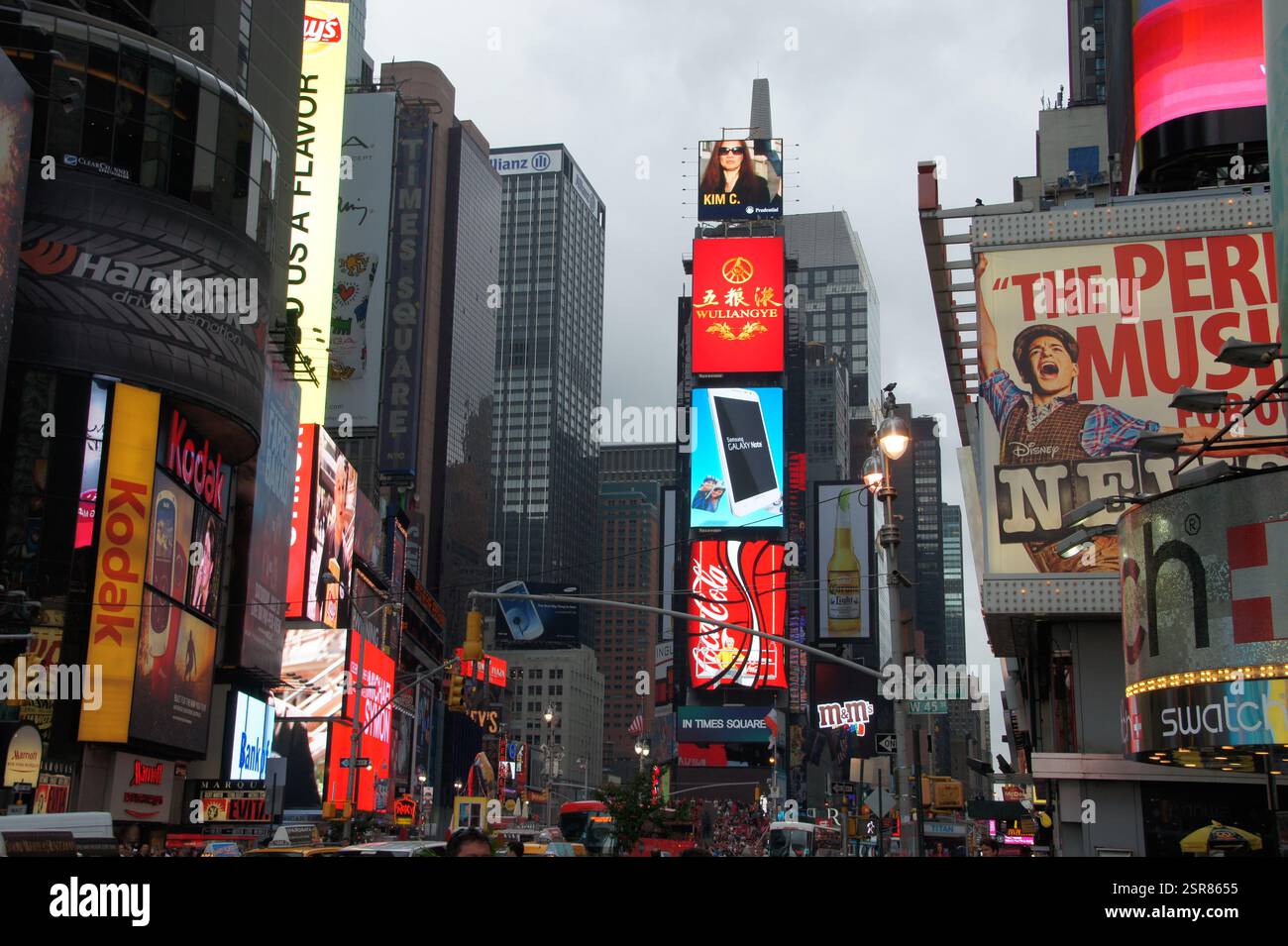 Manhattan explodes in neon. A dazzling tapestry of billboards paints ...