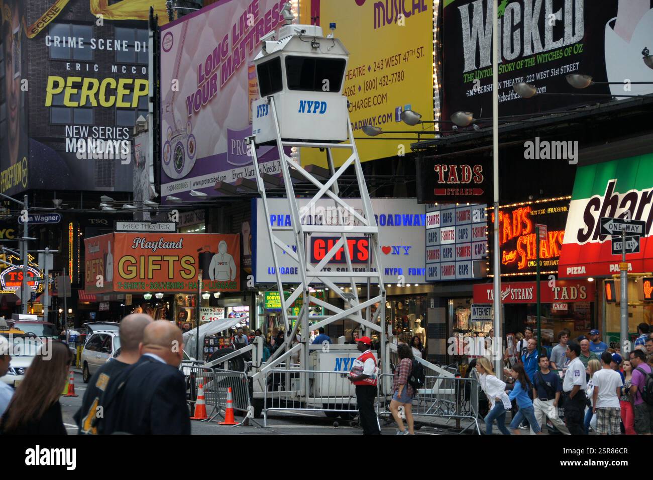 Manhattan's guardian gazes out. A watchtower in Times Square, a ...