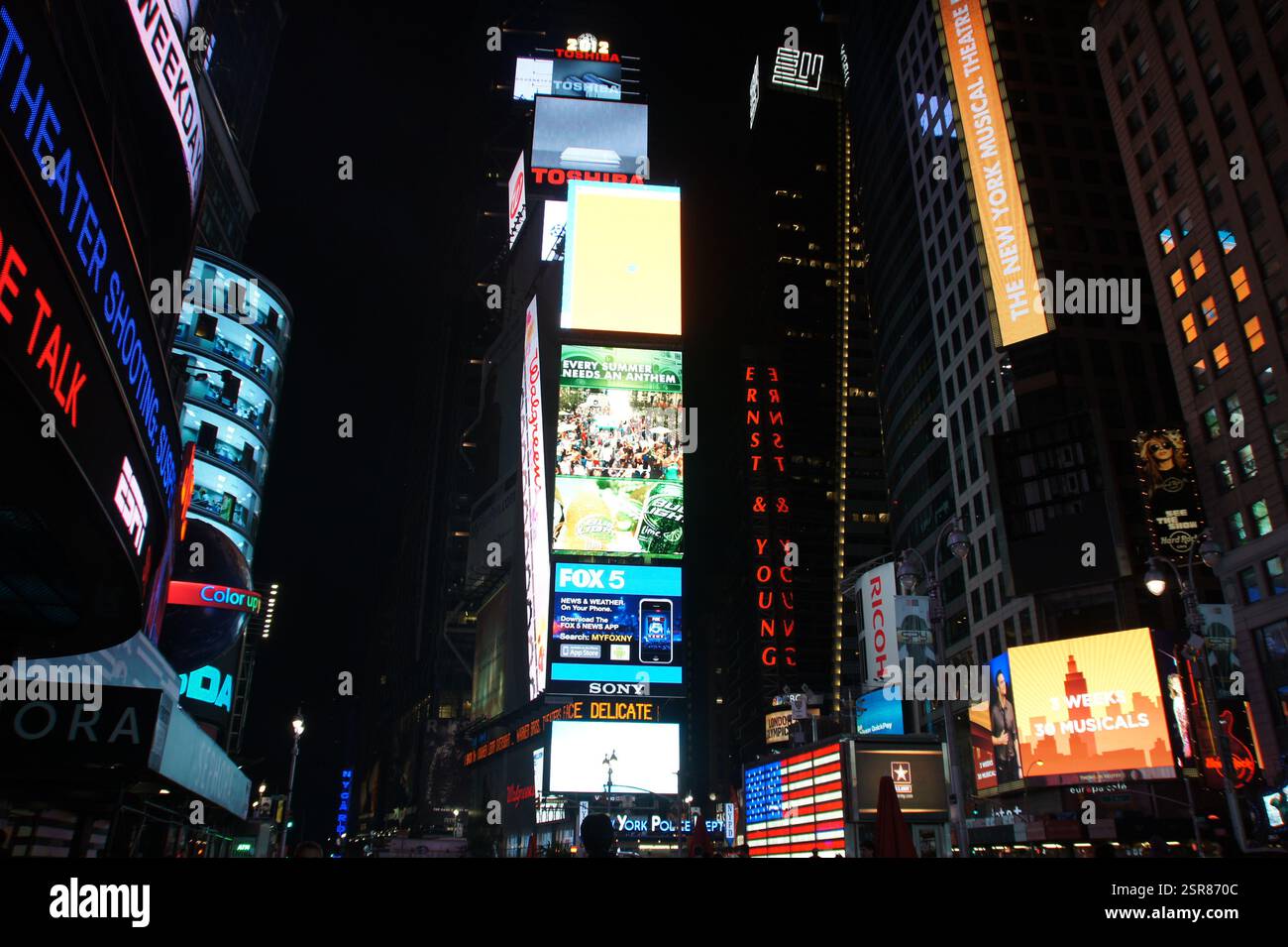 Dazzling lights and towering billboards bathe New York, Manhattan's ...