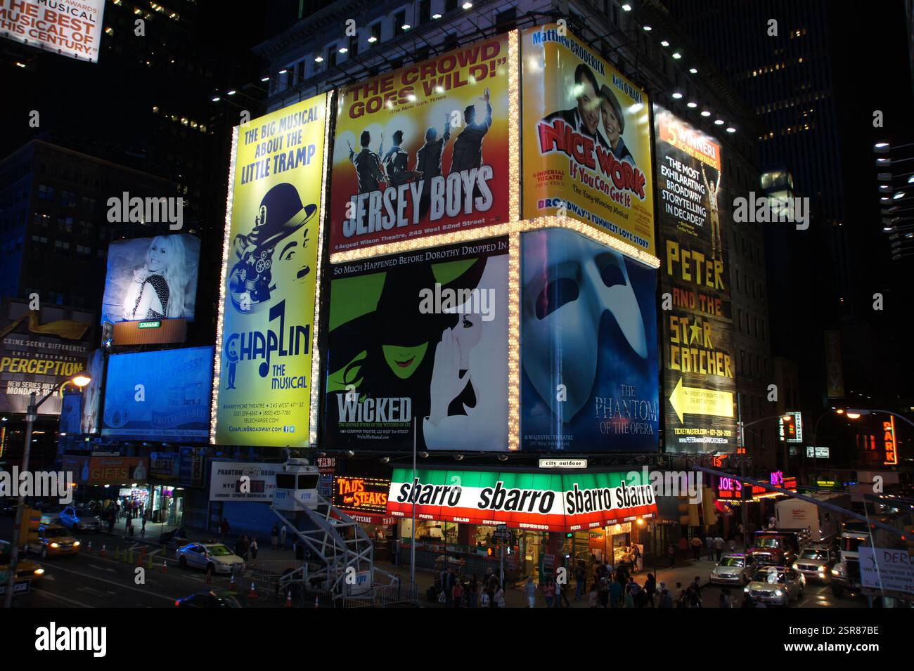 A massive billboard in New York, Manhattan's Times Square explodes with color and text ...