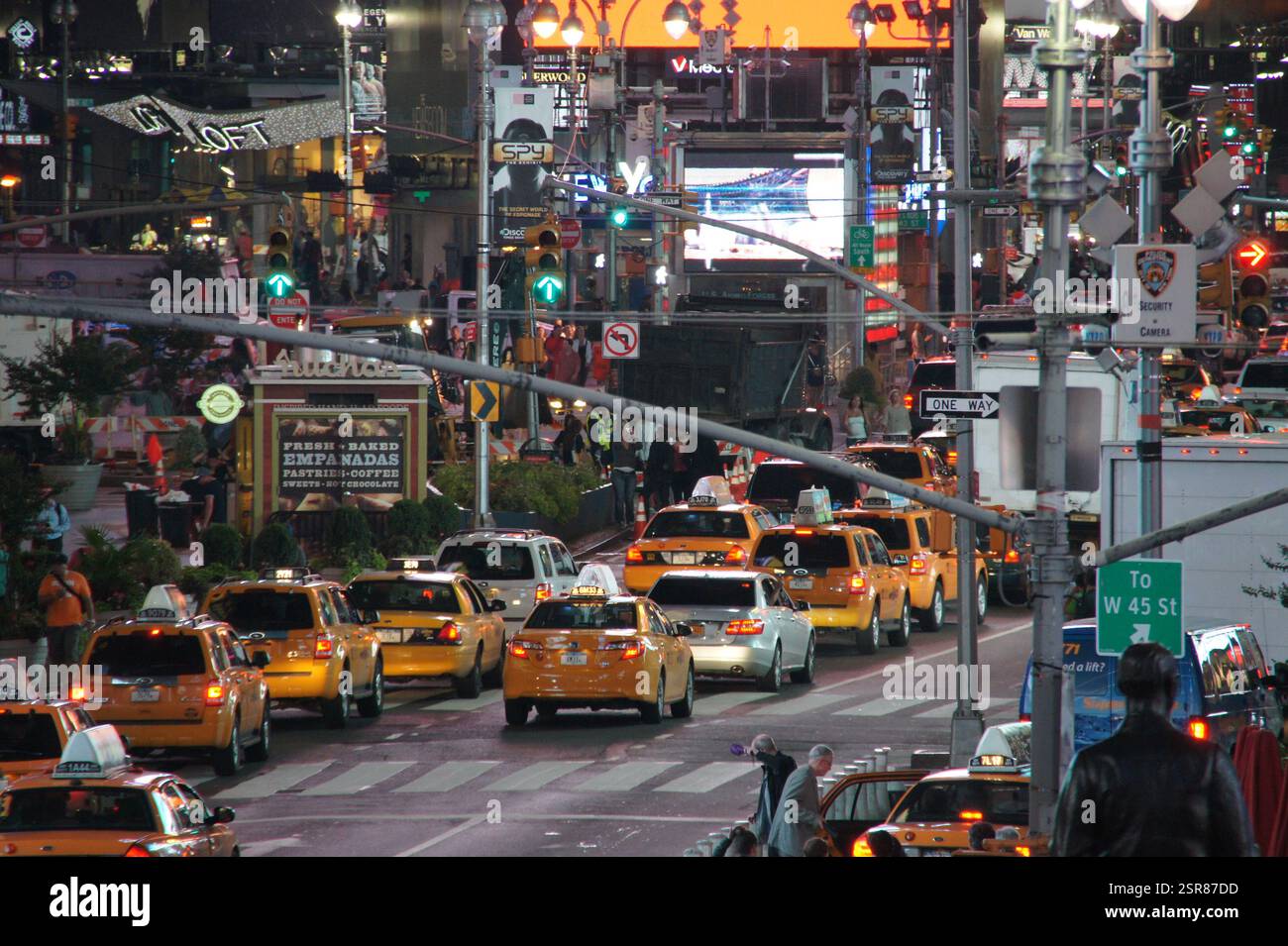 A colorful sign in New York, Manhattan's Times Square advertises baked ...