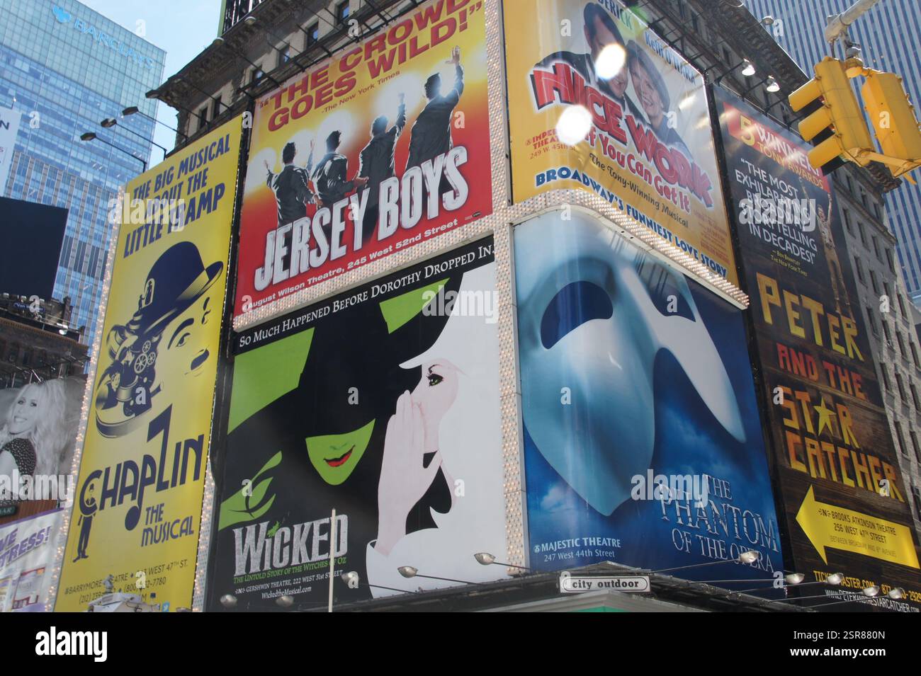 New York, Manhattan explodes with colorful digital billboards in Times Square. Blazing ...