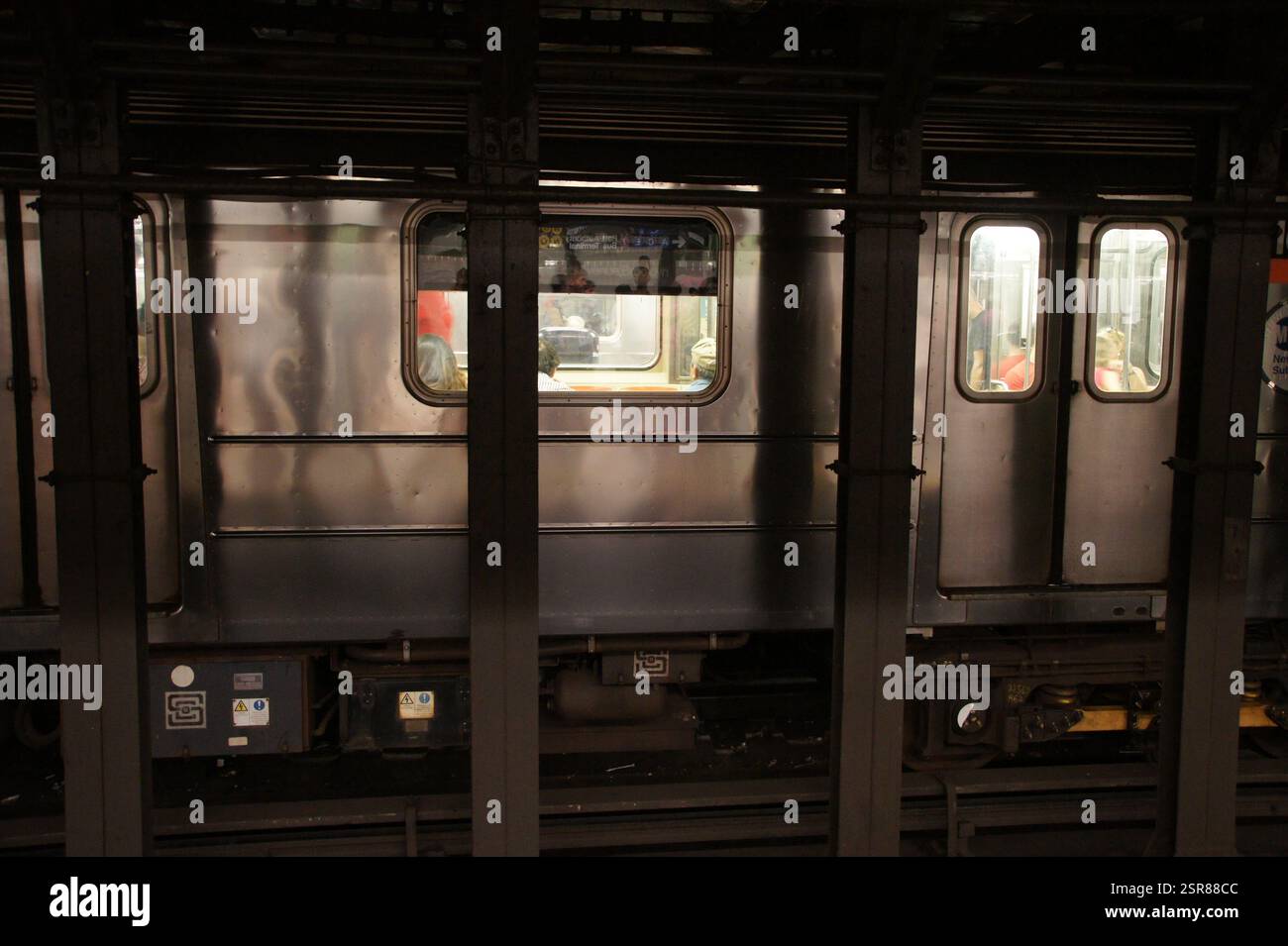 A subway train pulls into a station platform, a familiar sight for many ...