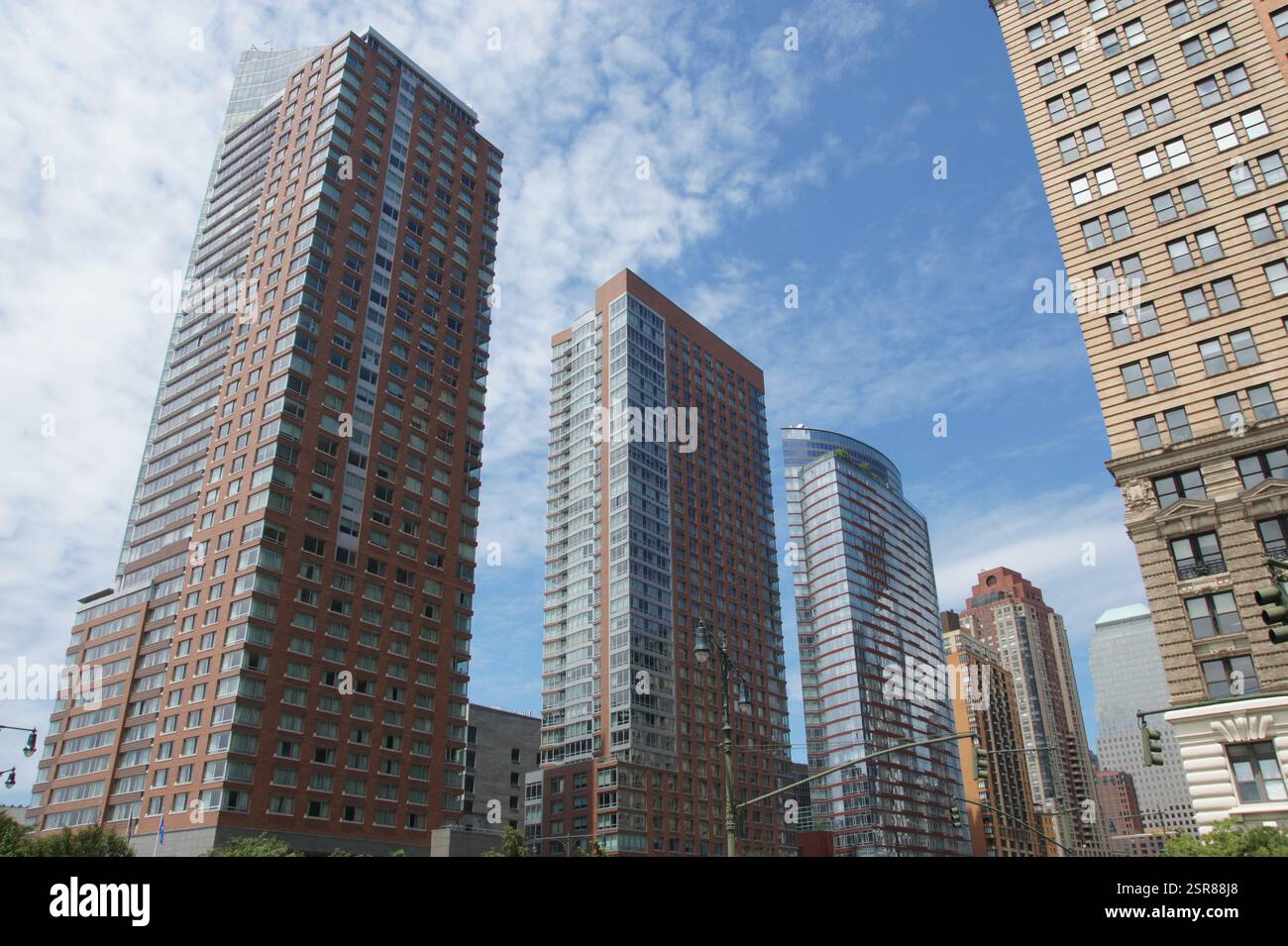 Skyscrapers pierce the sky in New York, Manhattan, with reflective ...