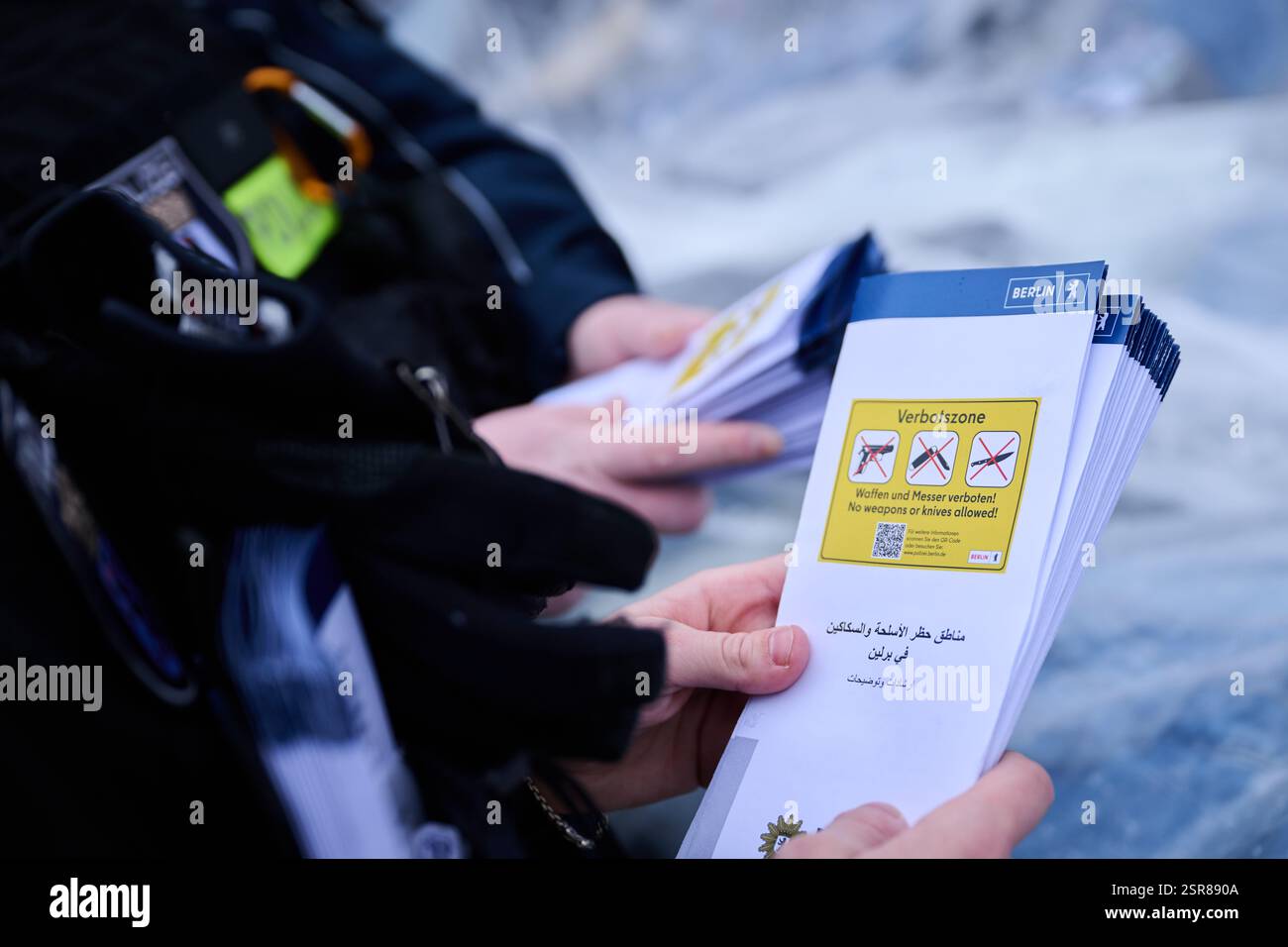 Berlin, Germany. 15th Feb, 2025. Police officers hand out flyers in ...