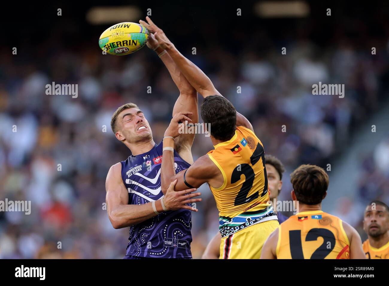 Perth, Australia. 15th Feb, 2025. Liam Reidy of the Dockers and Ash ...