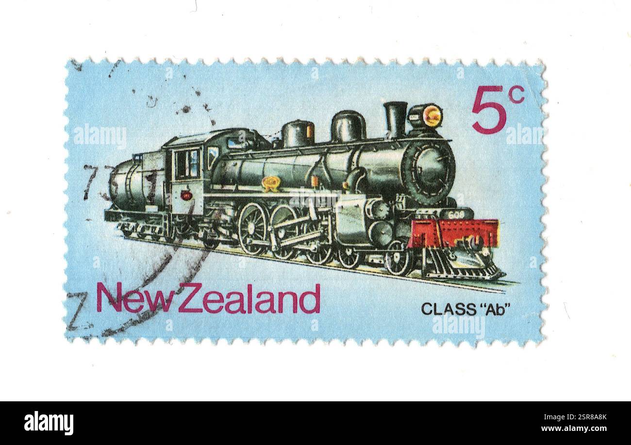 A vintage railway engine postage stamp from New Zealand isolated on a ...