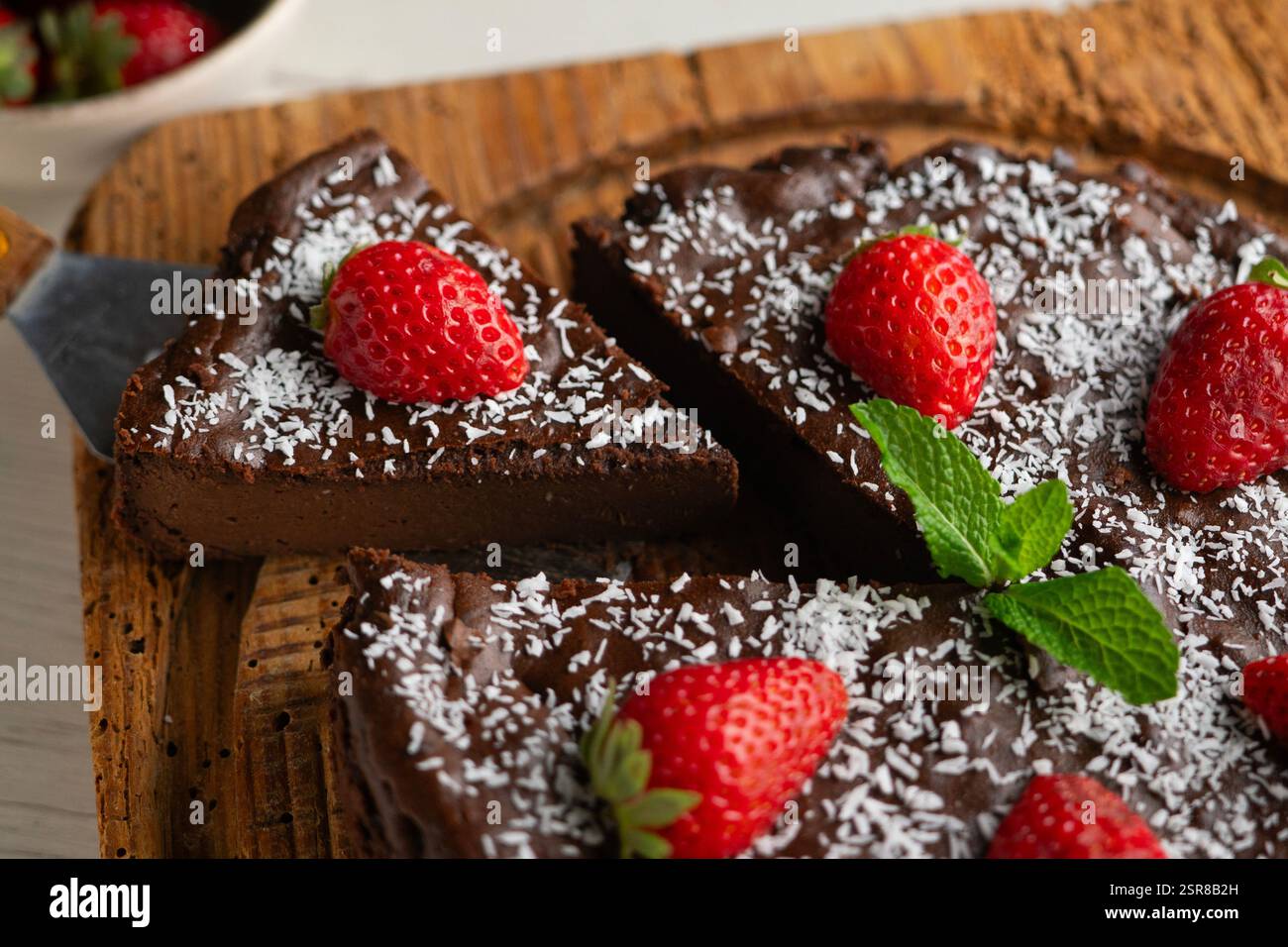 Delicious sweet cheesecake with chocolate and fresh strawberries Stock ...