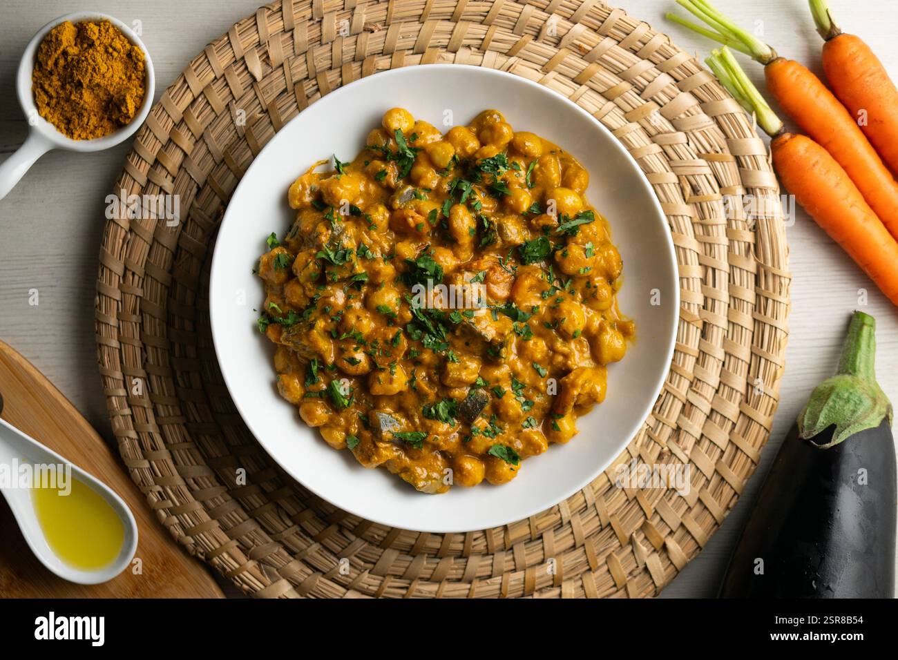 Chickpea curry with eggplant, a traditional Indian vegan recipe Stock ...