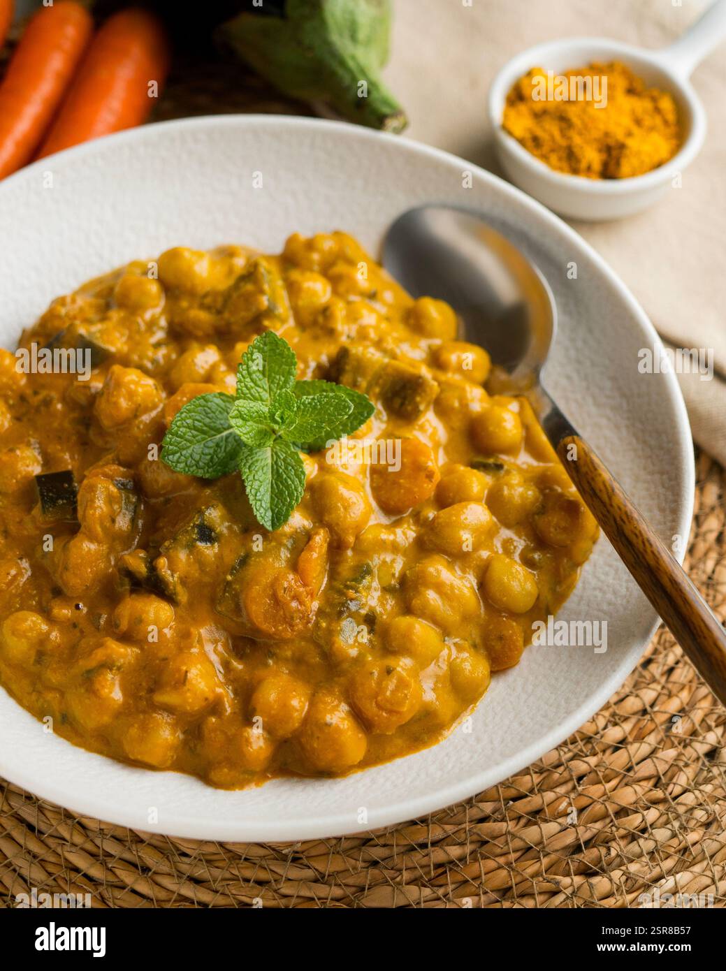 Chickpea curry with eggplant, a traditional Indian vegan recipe Stock ...