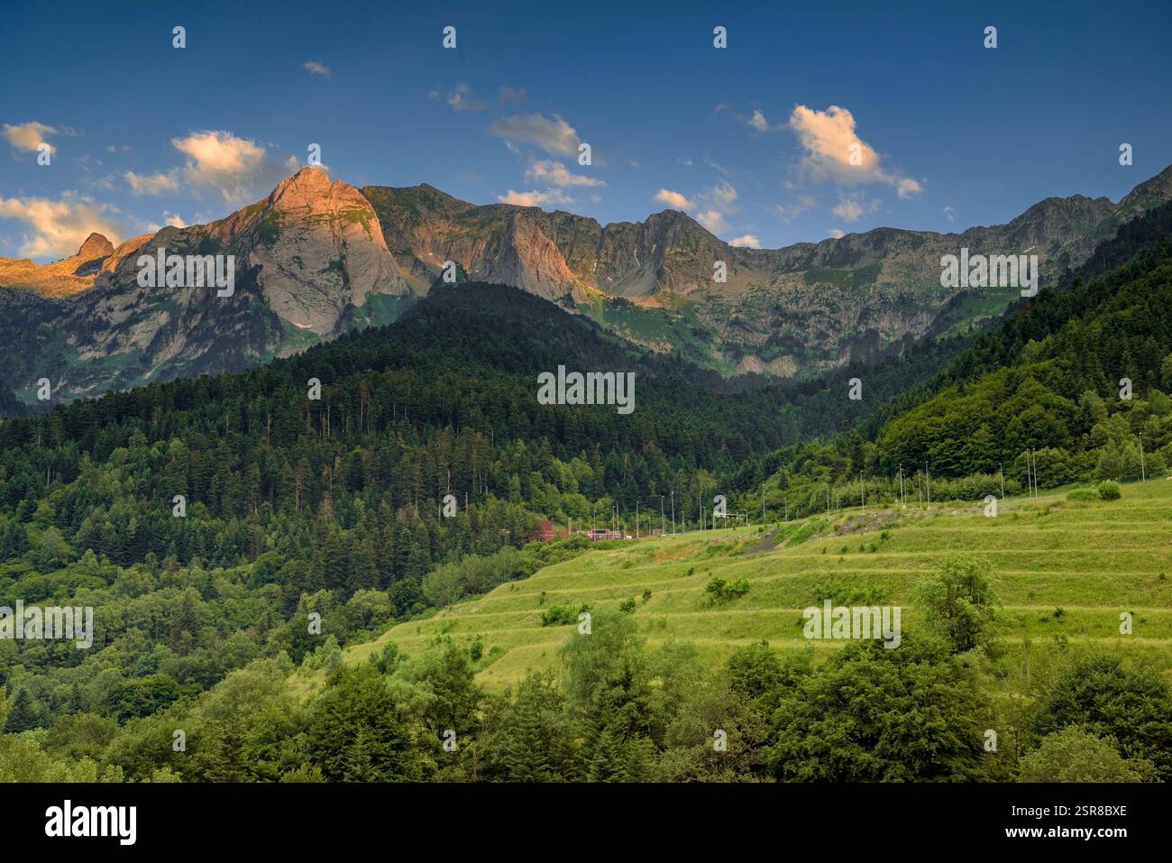 Sunset over the mountains at the northern entrance to the tunnel and port of Vielha, where the ...