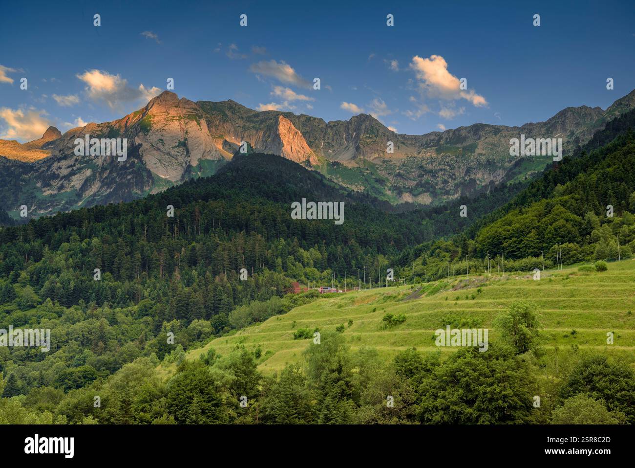 Sunset over the mountains at the northern entrance to the tunnel and ...