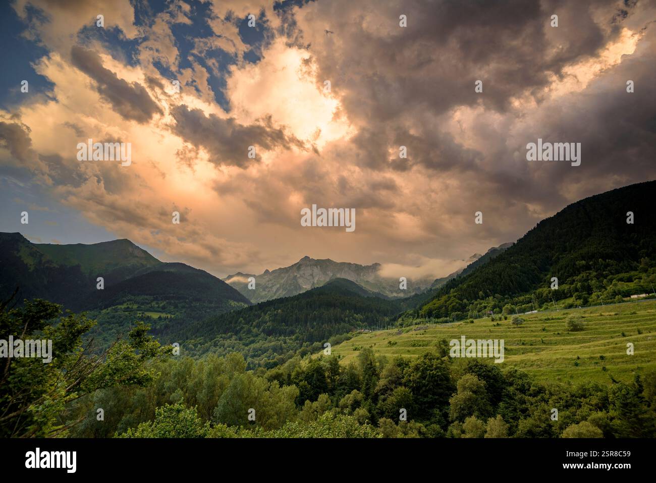 Sunset over the mountains at the northern entrance to the tunnel and ...