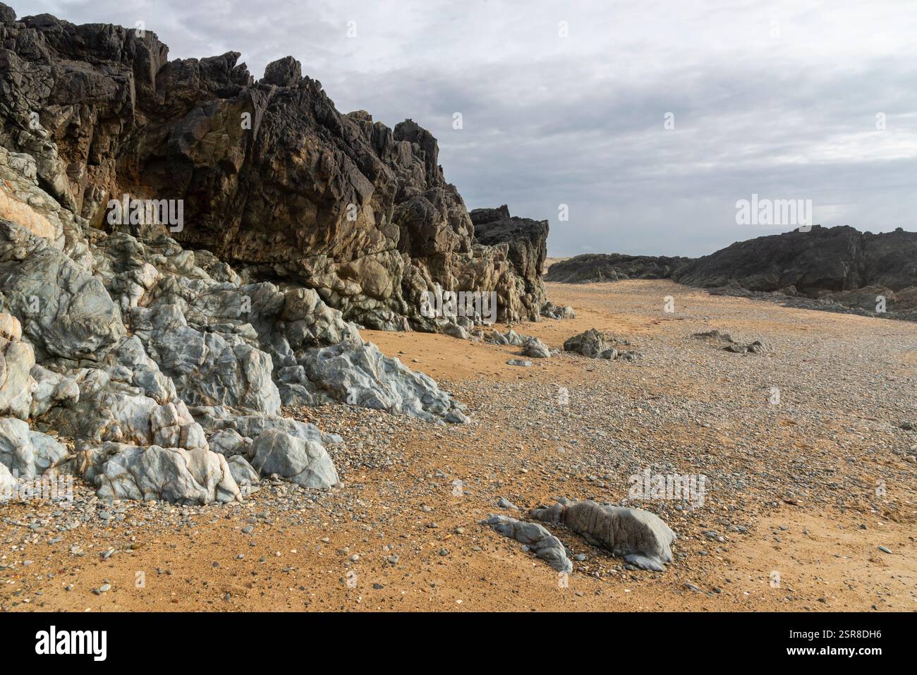 Rocks on the beach near Rhosneigr on the coast of Anglesey, North Wales ...