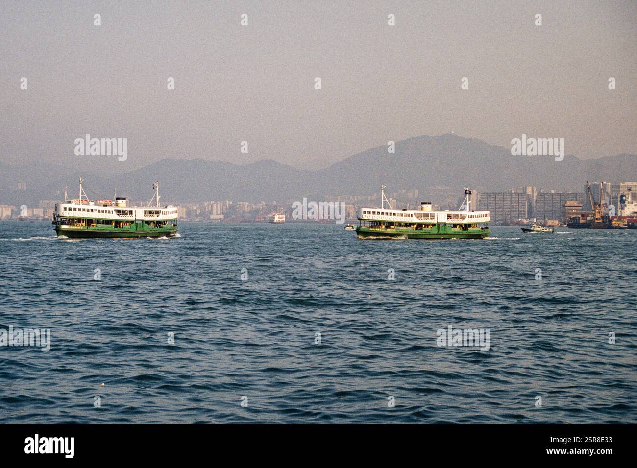 The star ferry, two passenger ferries in Victoria Harbour, Hong Kong ...