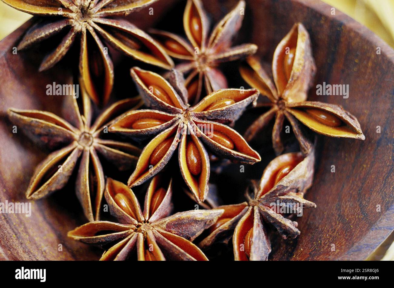 Indian spices, star anise illicium verum in wooden bowl, India, Asia ...