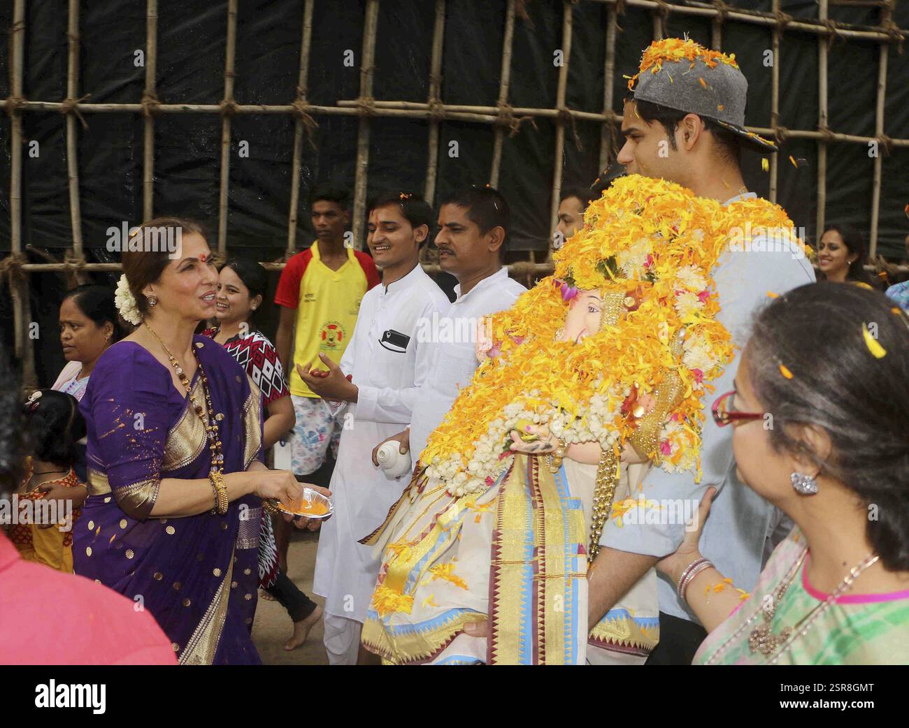 Bollywood actor Dimple Kapadia participates procession immersion of an ...