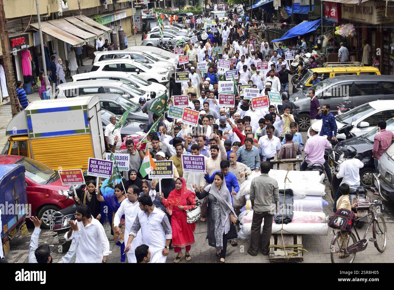 All India Majlis-e-Ittehadul Muslimeen (AIMIM) workers take a part in ...