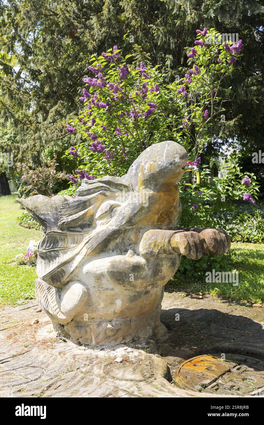 Water dispenser in the form of a sculpture of Jonah in the belly of a ...
