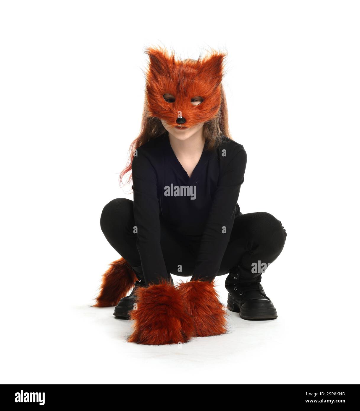 Quadrobics. Girl wearing fox mask, tail and gloves on white background ...