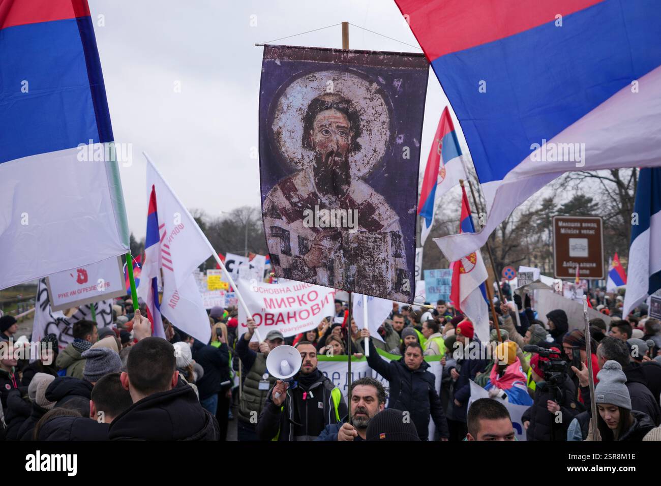 People attend a protest triggered after a concrete canopy on a railway ...