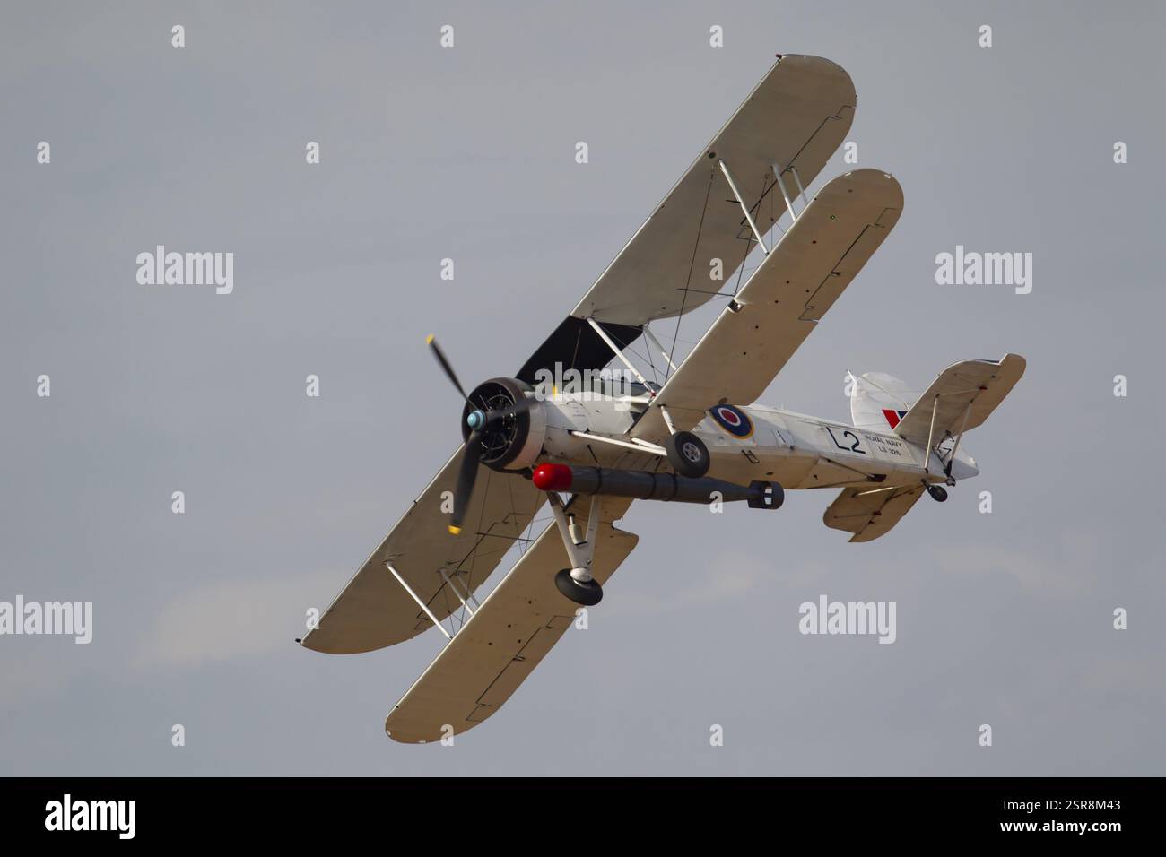 Fairey Swordfish warbird biplane aircraft in Royal Navy colours flying ...