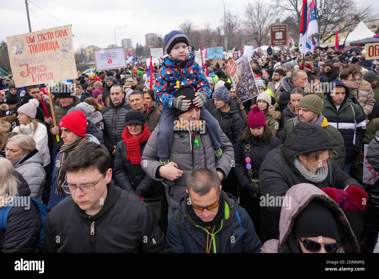 People attend a moment of silence during a protest triggered after a ...