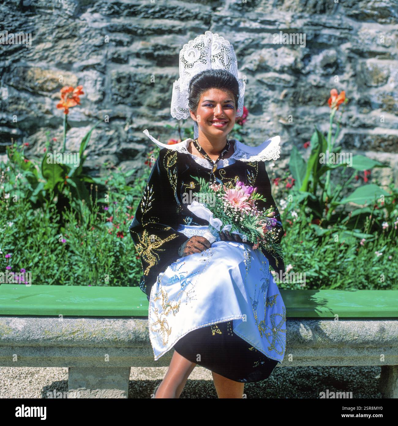 Woman in Breton traditional costume, Quimper, Finistere, Brittany ...