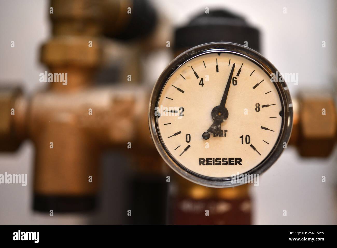 Pressure gauge, water meter, old heating system, gas heating, building ...