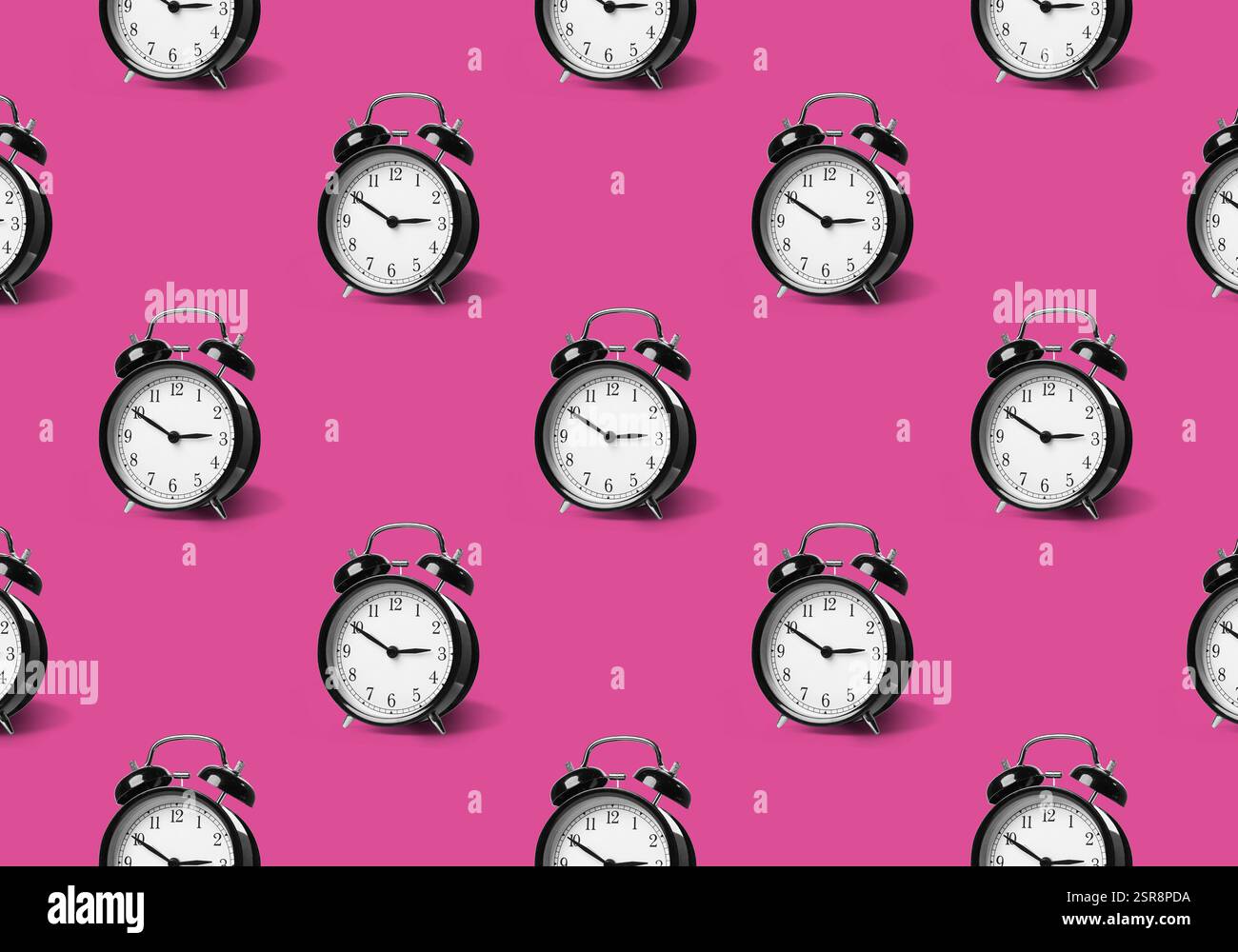Pattern of black alarm clocks on violet red background Stock Photo - Alamy